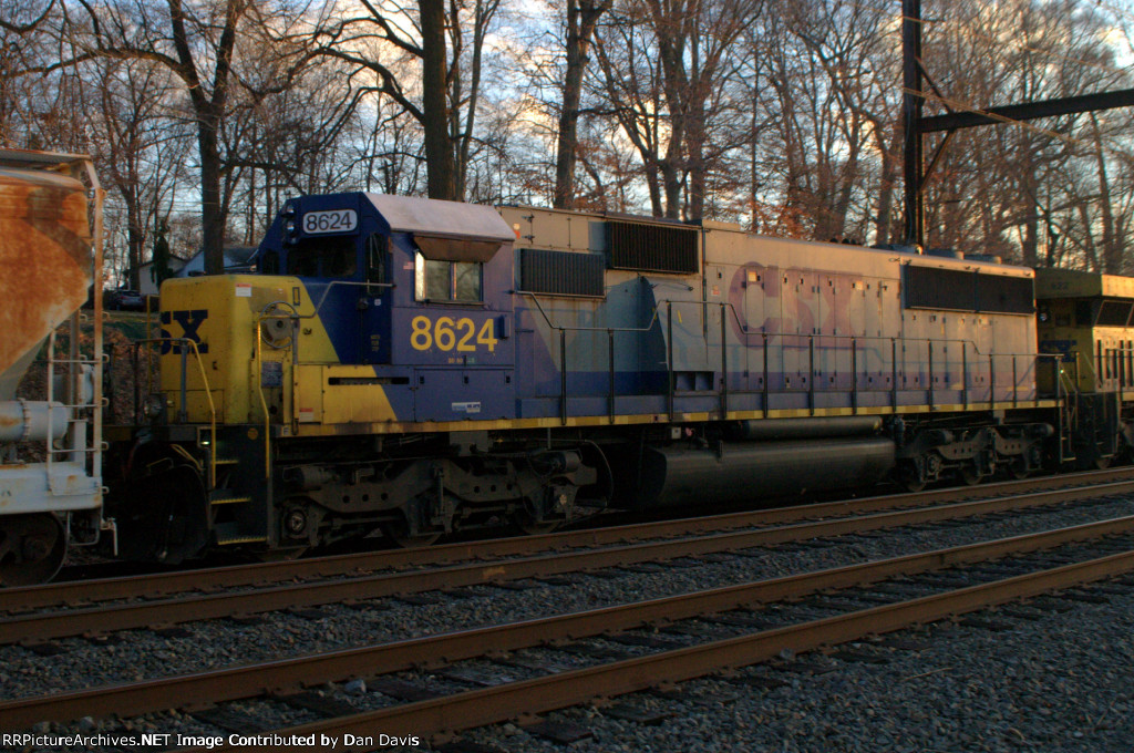 CSX SD50-2 8624 in YN2 paint trails on Q301-26